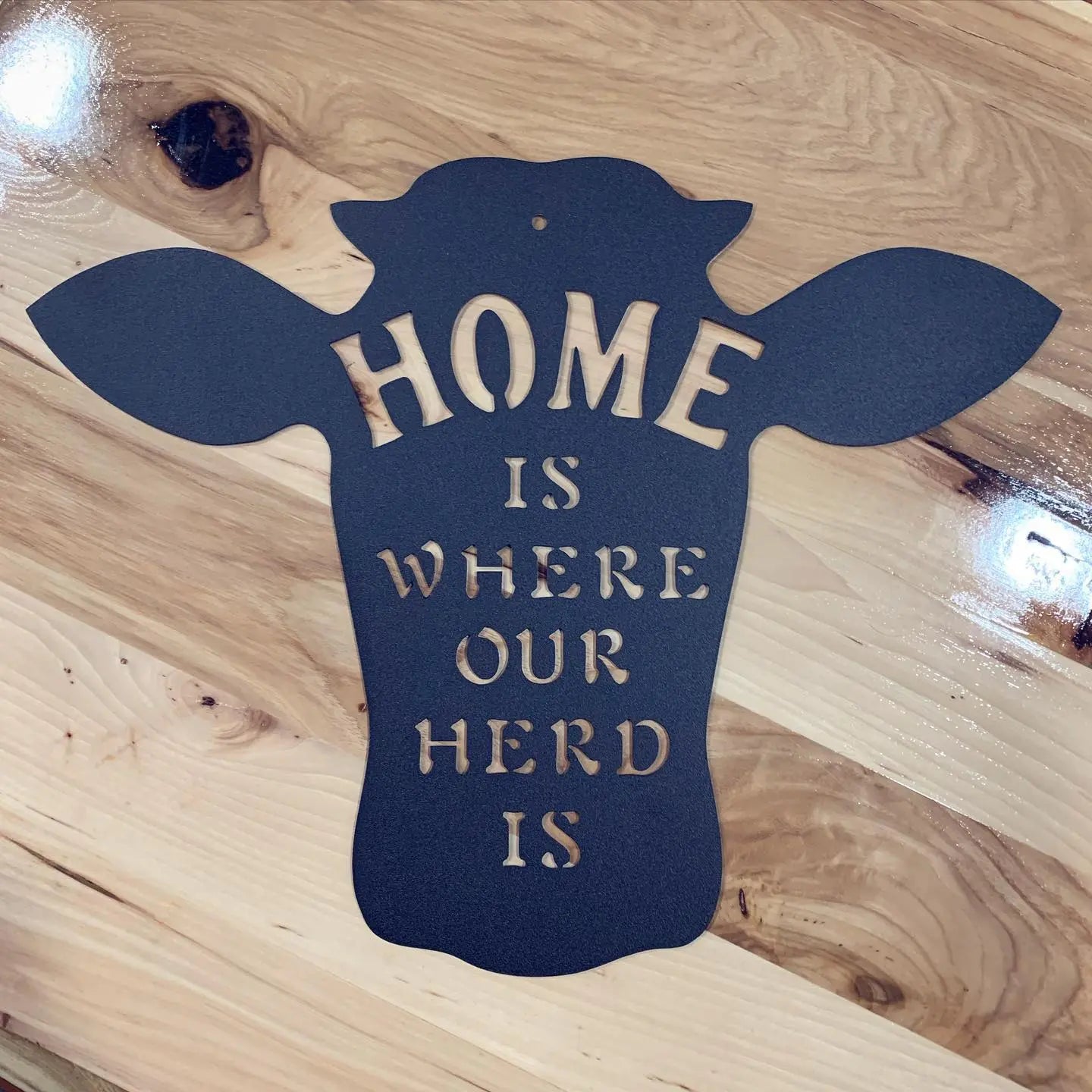 Cow head sign - "Home is where the herd is" | The Metal Peddler